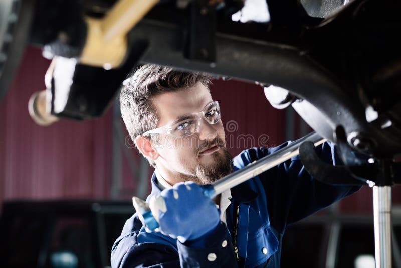 Car mechanic at work stock image. Image of young, transportation - 40342019