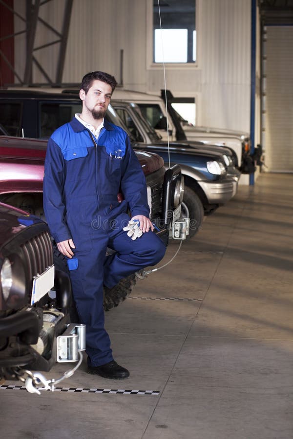Car mechanic at work stock image. Image of handsome, male - 40342069