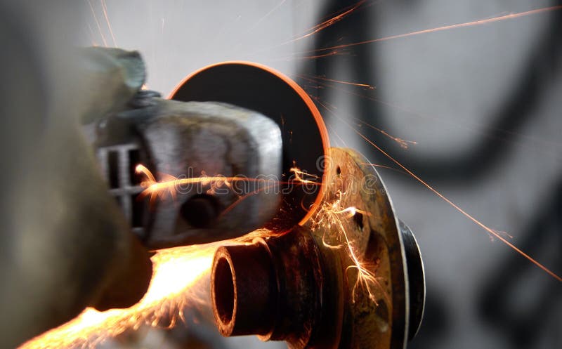 Car Mechanic Working with Angular Grinding Machine Stock Photo - Image ...