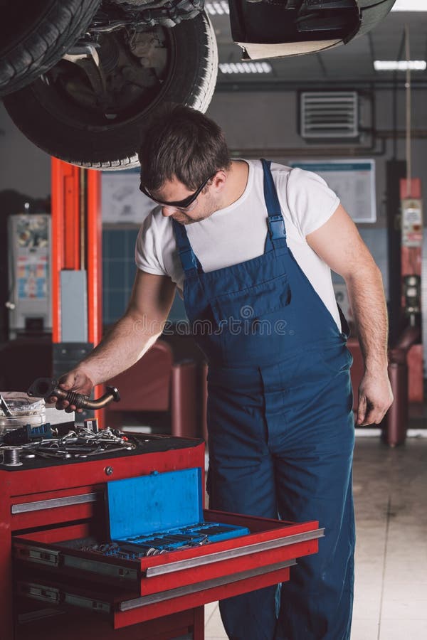 Car Mechanic Working in Auto Repair Service Stock Photo - Image of shop ...