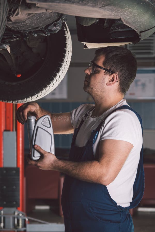 Car Mechanic Working in Auto Repair Service Stock Photo - Image of ...