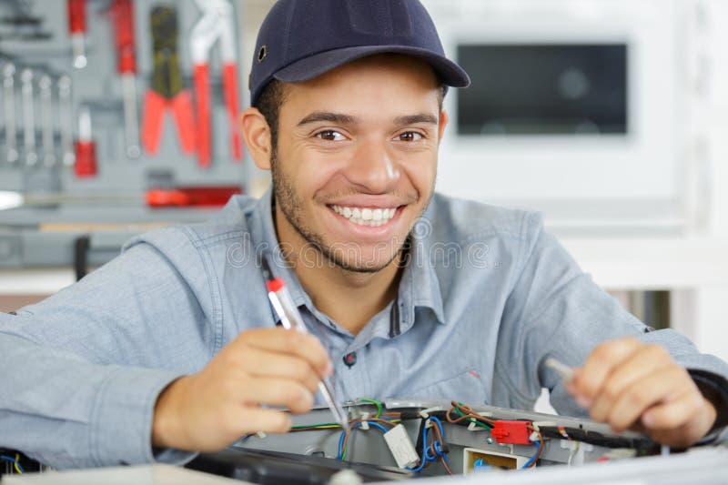 Car Mechanic Working at Automotive Service Center Stock Photo - Image ...
