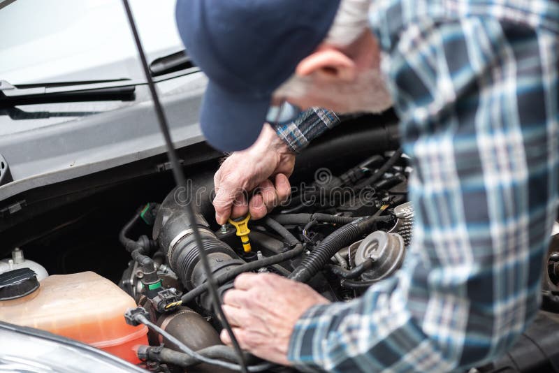 Car Mechanic Working on Car Engine Stock Photo - Image of checking ...