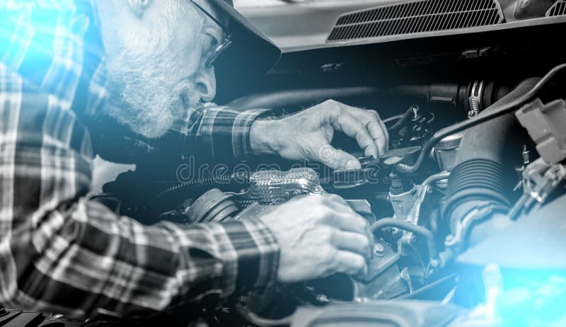 Car Mechanic Working on Car Engine Light Effect Stock Image - Image of ...