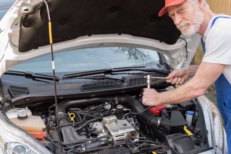 Car Mechanic Working on Car Engine Stock Image - Image of technician ...