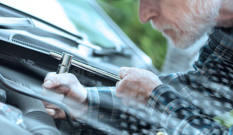 Car Mechanic Working on Car Engine Light Effect Stock Image - Image of ...