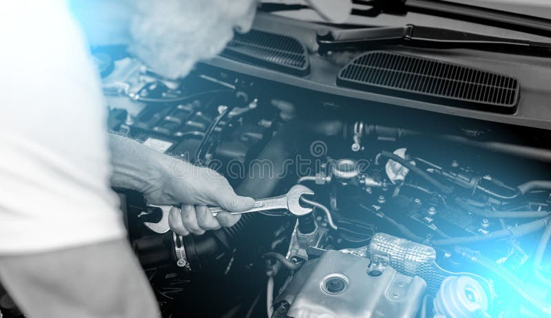 Car Mechanic Working on Car Engine; Multiple Exposure Stock Image ...