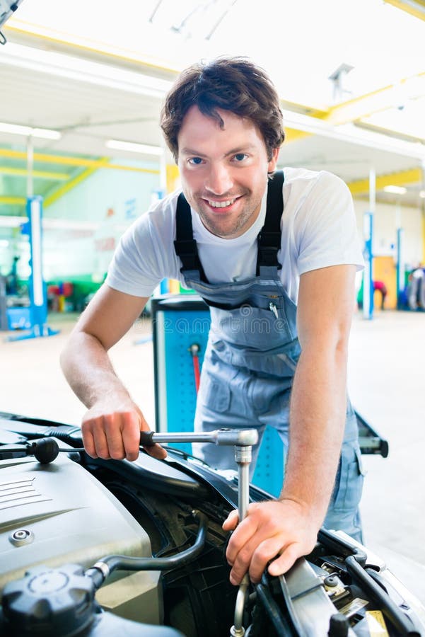 Mechanic Working - Car Workshop Stock Photo - Image of handsome, male ...