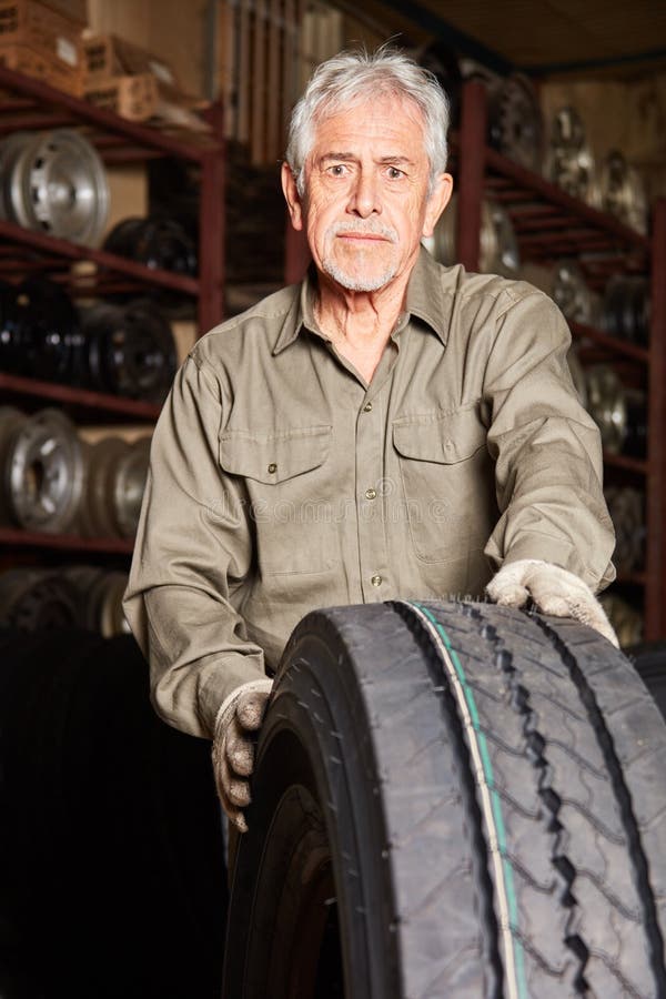 Car Mechanic with Experience with Car Tires Stock Image - Image of ...