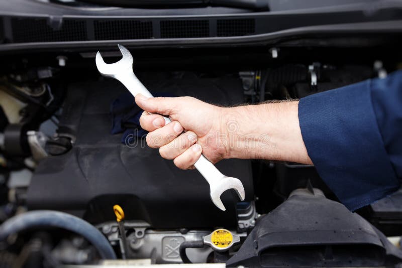 Car mechanic with wrench. stock image. Image of people - 79647079