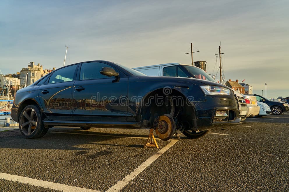 A Car Missing the Front Right Wheel Stock Image - Image of removed ...