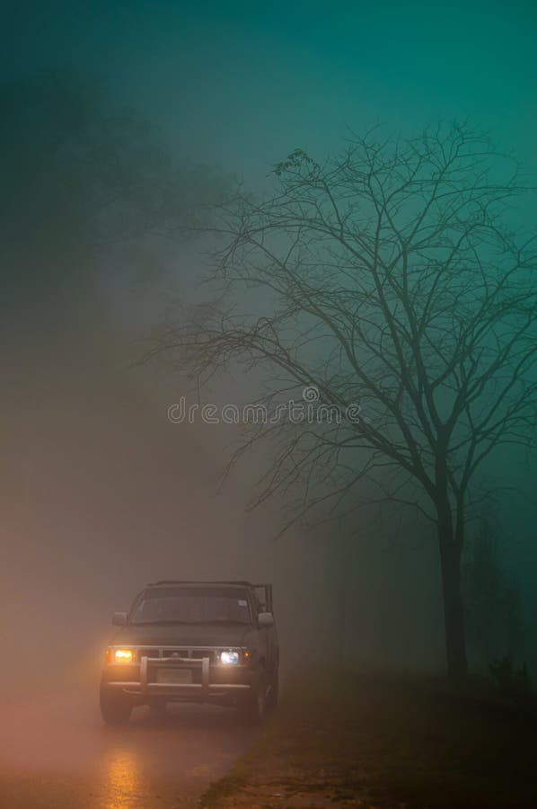 Car in the mist stock photo. Image of evening, thailand - 25044084