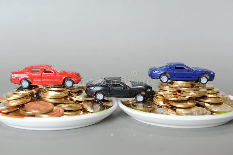Car models and coins stock image. Image of individual - 166152977