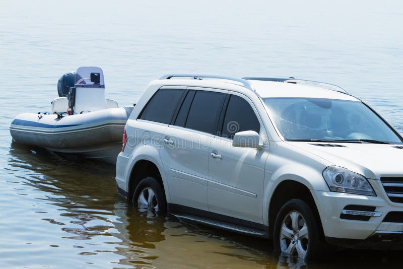 Car and Motor Boat in the Lake Stock Photo - Image of river, motorboat ...