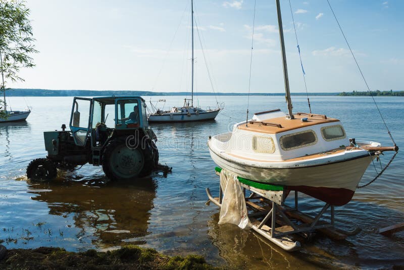 Car and Motor Boat in the Lake Stock Image - Image of vehicle, beach ...