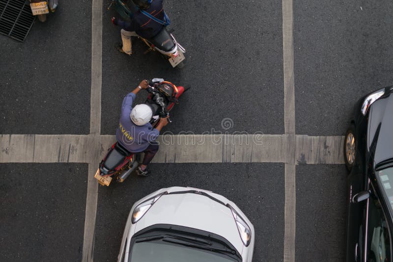 Car and Motorcycle at Intersection with Traffic Light Editorial Image ...