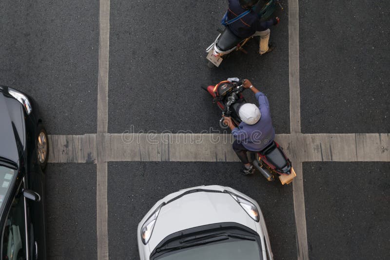 Car and Motorcycle at Intersection with Traffic Light Editorial Stock ...