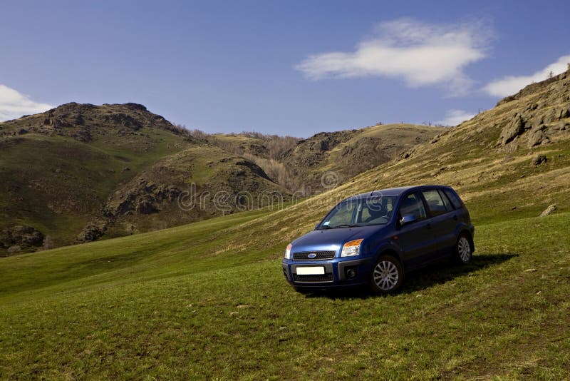 Car on a mountain slope stock photo. Image of scenery - 9393078