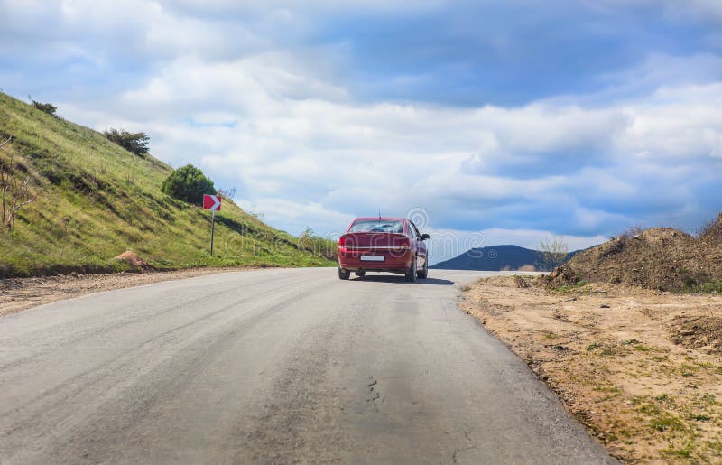 Car Moves Along a Winding Road Stock Image - Image of area, background ...