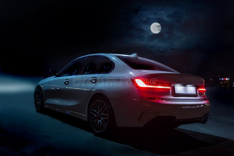 Car Moves on the Road on a Moonlit Night Stock Image - Image of ...