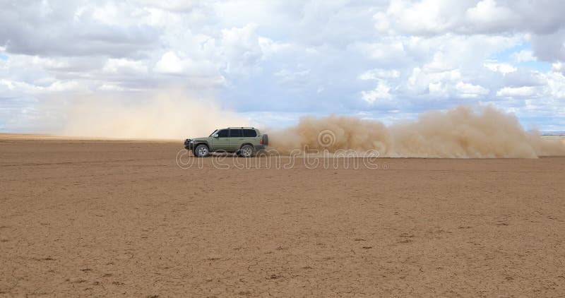 Car moving on a desert stock footage. Video of long - 180216018