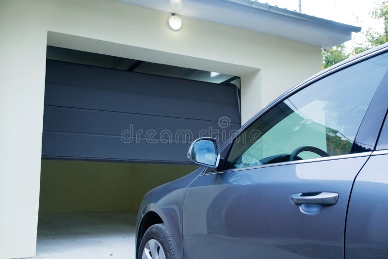 Car Near the Automatic Garage Door Stock Image - Image of residential ...