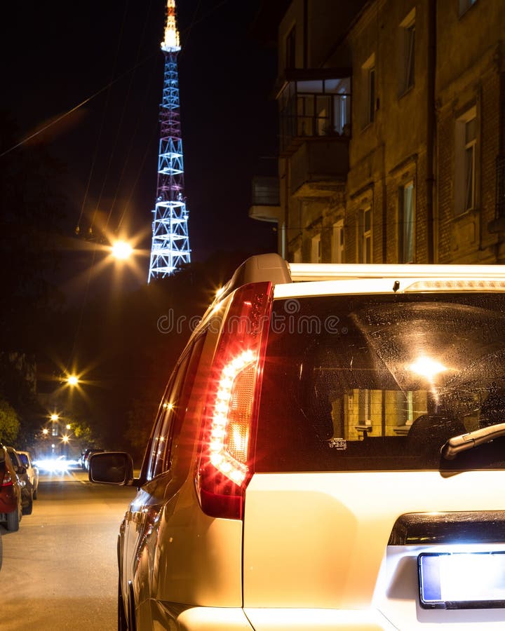 Car at night city street stock photo. Image of tower - 196989308
