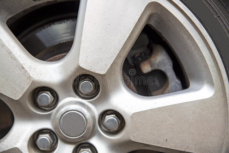Car Nuts on a Wheel, Close-up Stock Photo - Image of modern, automobile ...