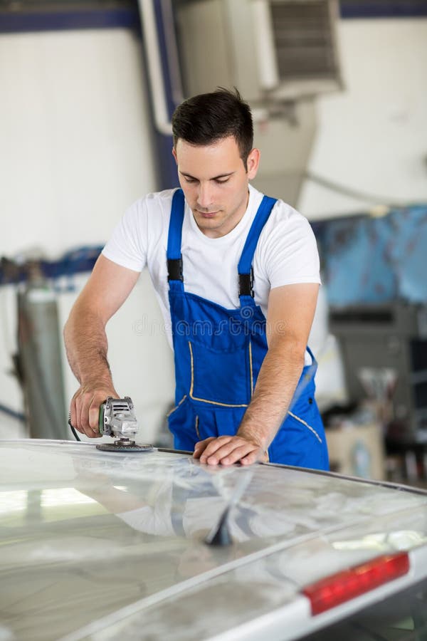 Car painter polishing part stock photo. Image of garage - 61613196