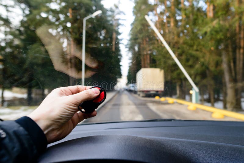 Car Park Automatic Entry System. Man with Remote Control Opens B Stock ...