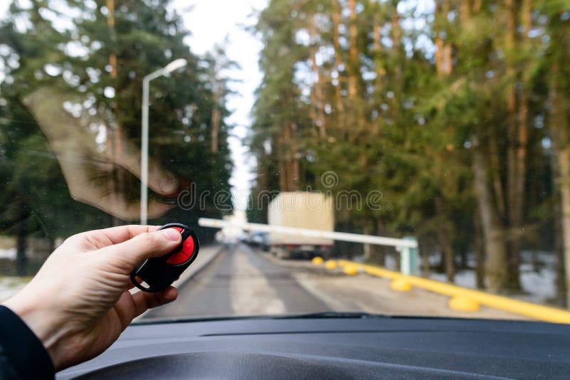 Car Park Automatic Entry System. Man with Remote Control Opens B Stock ...