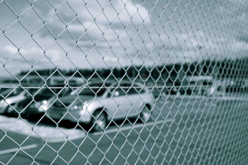 Car Park Behind Security Fence Stock Image - Image of guard, duotone ...