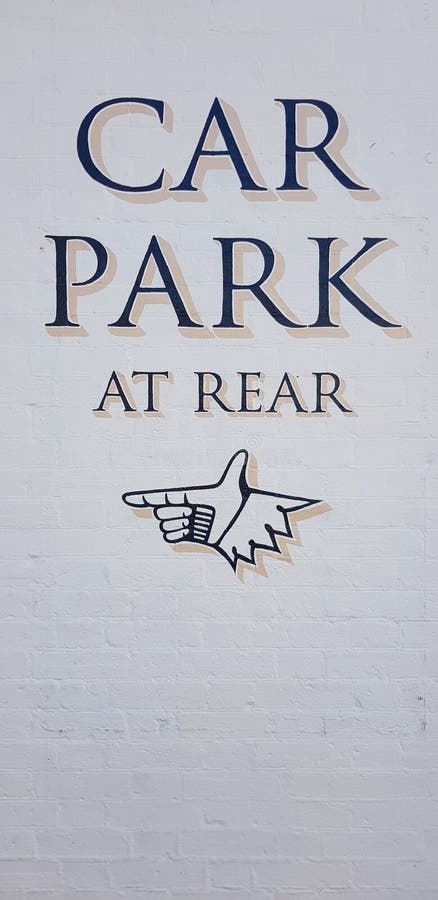 Car Park at Rear Wall Sign. Stock Image - Image of sign, wall: 176678047