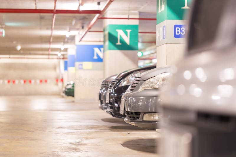 Car Park in Underground Building with Copy Space. Stock Photo - Image ...