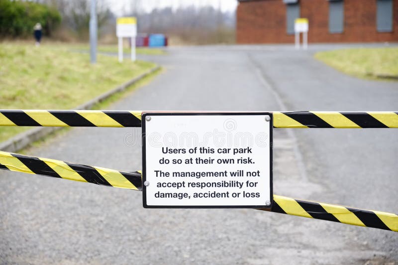 Car Park Users Do so at Own Risk Sign Stock Image - Image of urban ... Car Park Users Do so at Own Risk Sign Stock Image - Image of urban ...