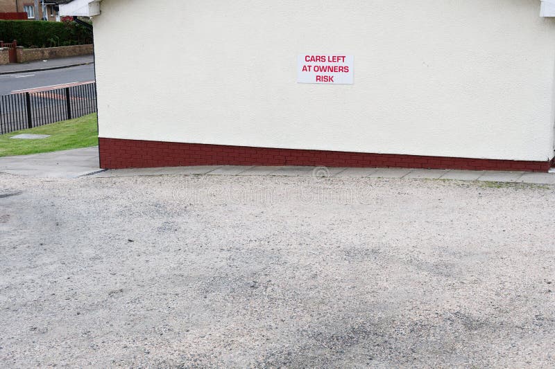 Car Park Users Park Here at Own Risk Sign Stock Photo - Image of accept ...