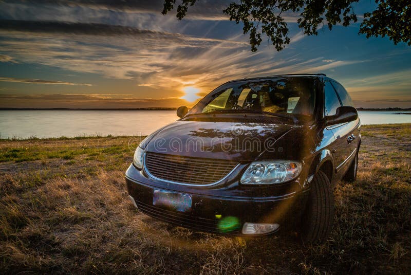 Car Parked in Front of a Lake at Sunset Stock Image - Image of nature ...