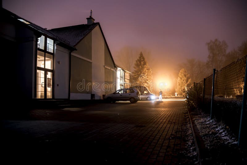 The Car is Parked Near the Building at Night Stock Photo - Image of ...
