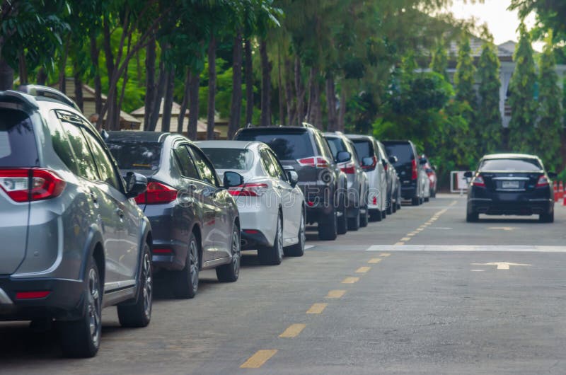 Car parked on the roadside stock photo. Image of road - 195046204