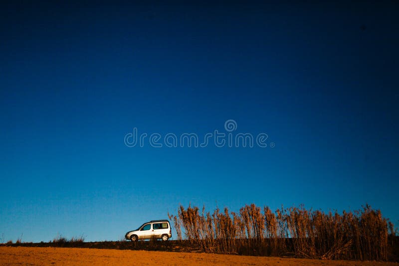 Car Parked by the Side of a Lonely Road in Rural Country Stock Image ...
