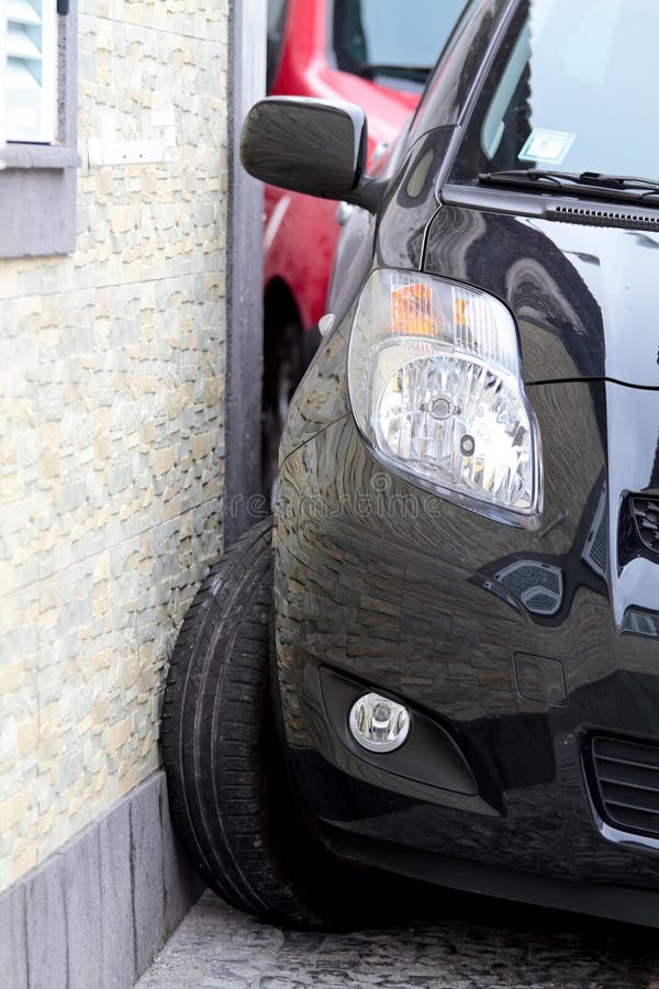 Car Parked Very Close To a Wall Stock Photo - Image of street, wheel ...