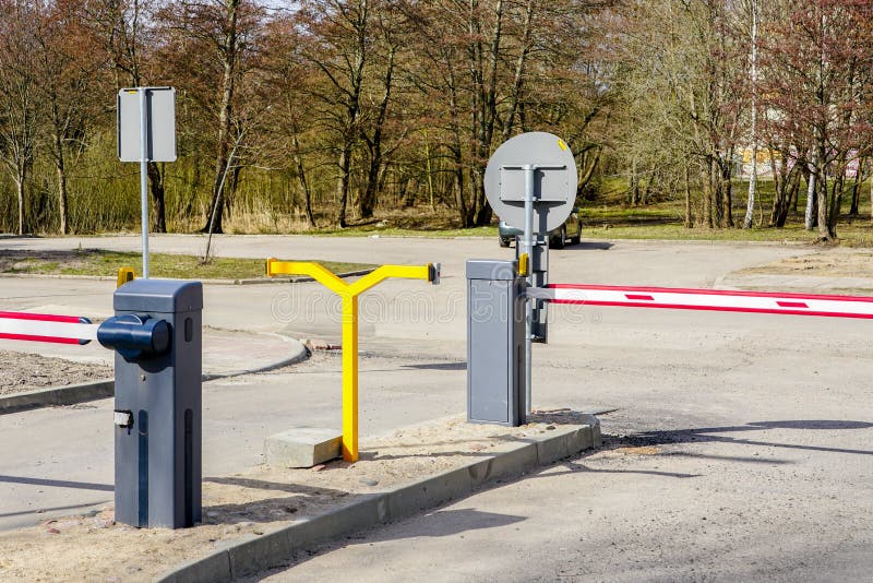Car Parking with Entry and Exit Control Barriers Stock Photo - Image of ...