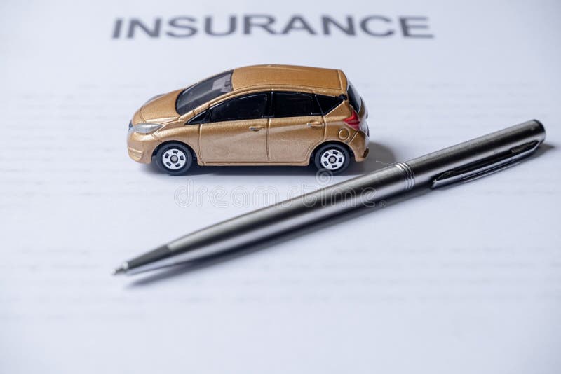 Car and Pen on Insurance Documents. Car Insurance Concept Stock Photo ...