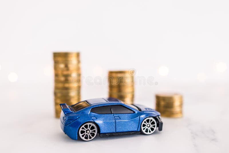 Car Prices Going Down, Toy Car in Fron of Decreasing Stacks of Coins ...