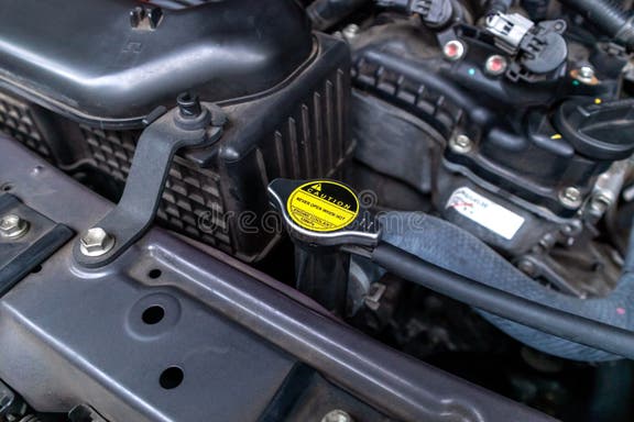 A Car Radiator Cap with Warning Sticker Never Open when Hot Stock Photo ...