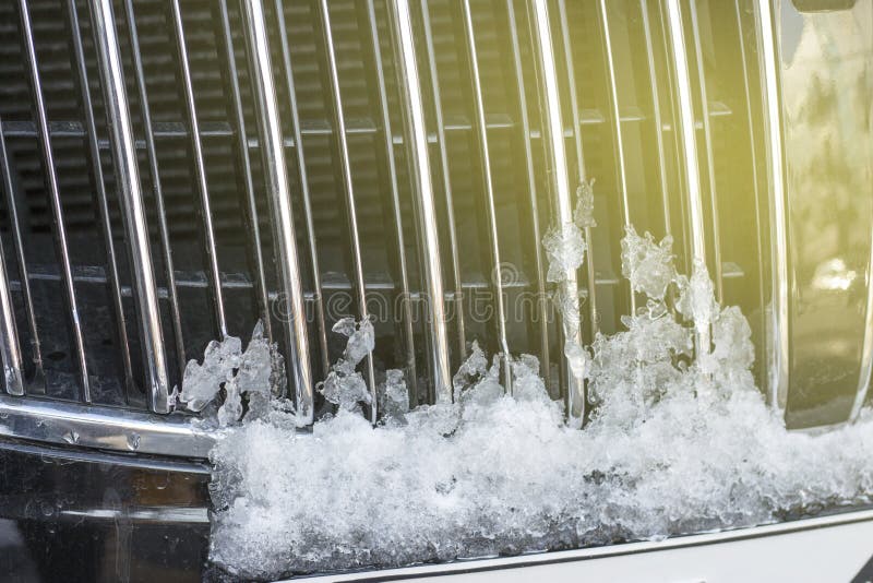 Car Radiator Grille in the Snow, Front View, Toned Stock Photo - Image ...