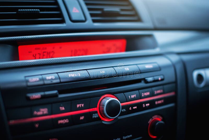Car Radio and Air Conditioner System. Button on Dashboard in Modern Car ...