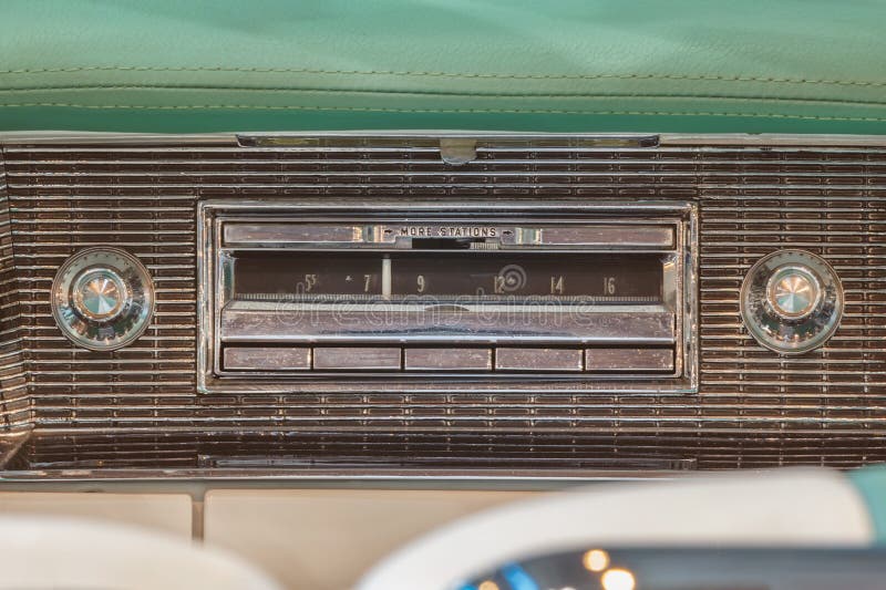 Car Radio Inside a Green Classic American Car with Chrome Dashboard ...