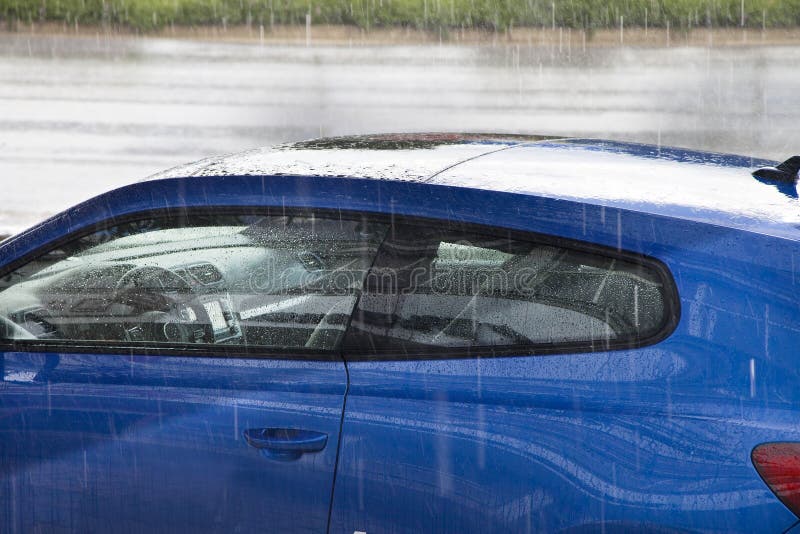 Car in rain stock image. Image of parked, street, auto - 26323249