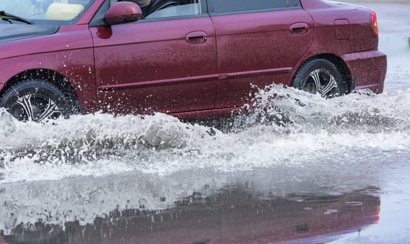 Car Rain Puddle Splashing Water Stock Photo - Image of bubble, drop ...